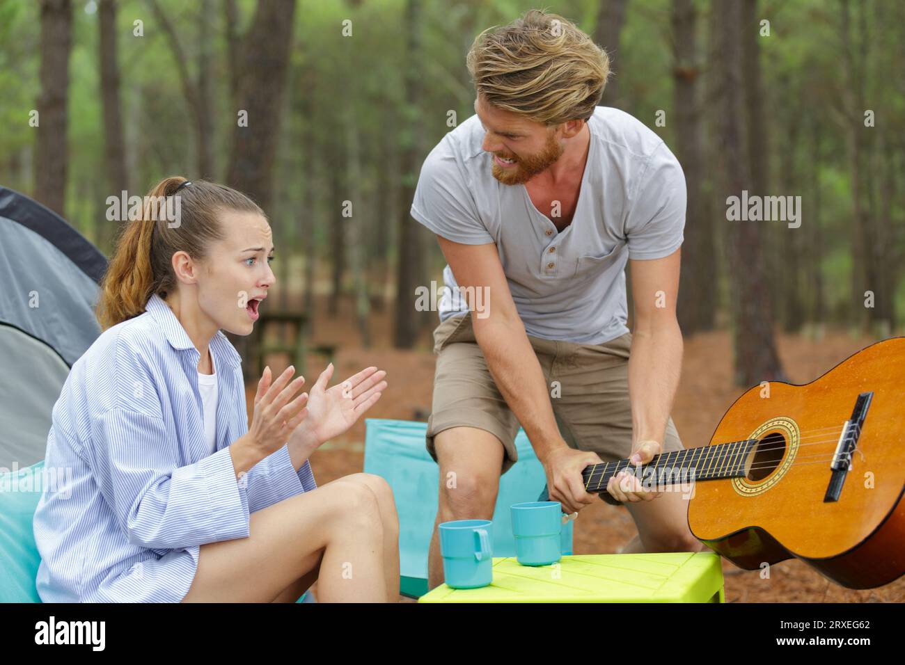 violent boyfriend hitting the table with guitar Stock Photo - Alamy