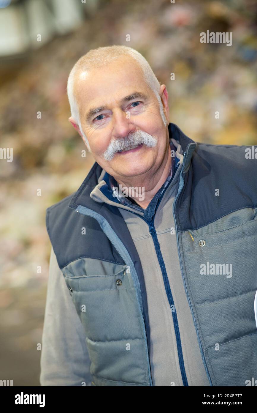 senior worker portrait in warehouse Stock Photo - Alamy