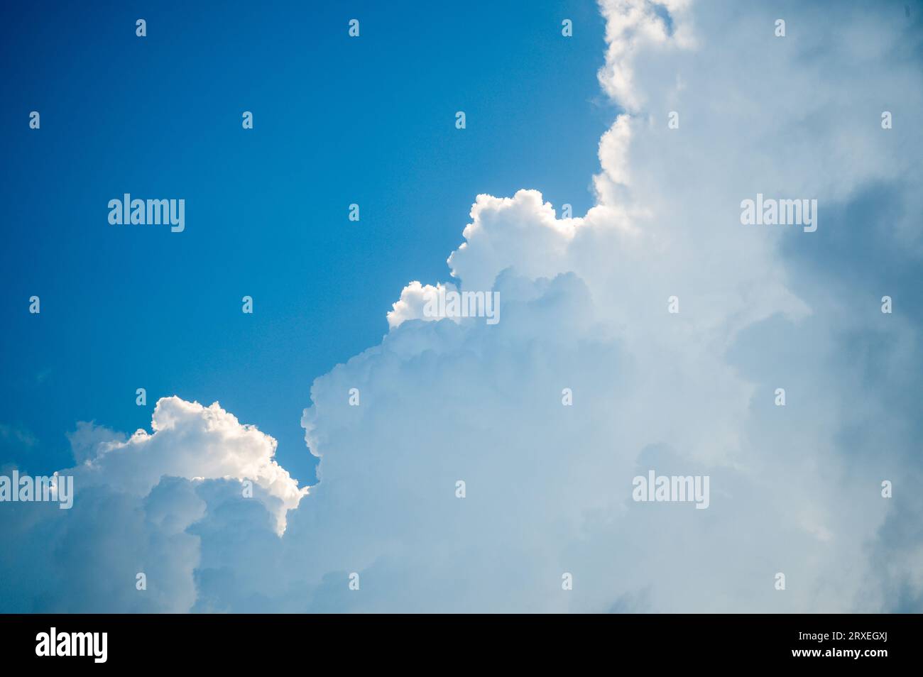 Blue sky and unpredictable white clouds. Amazing nature. Impact of ...