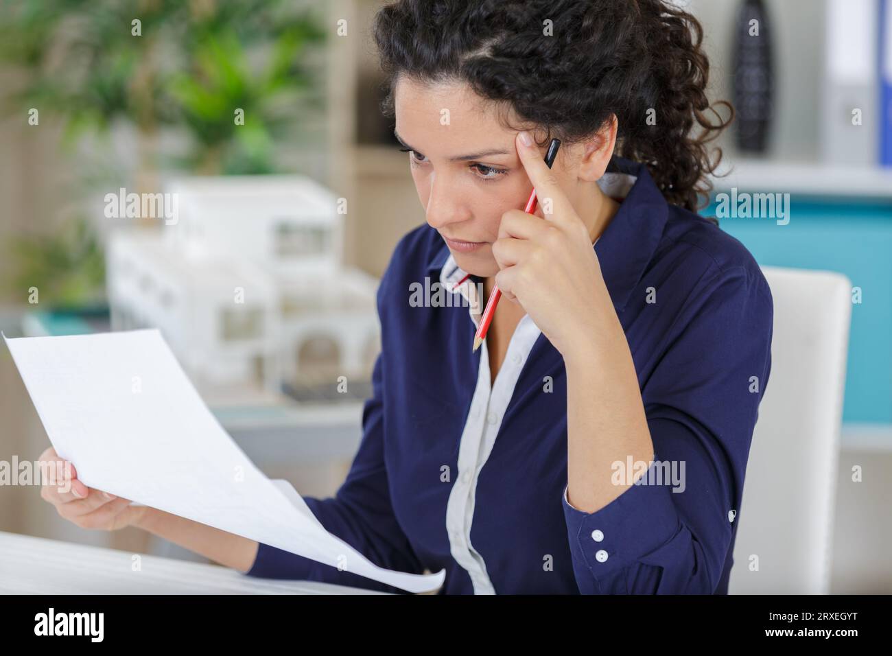 Architect checking plans hi-res stock photography and images - Alamy