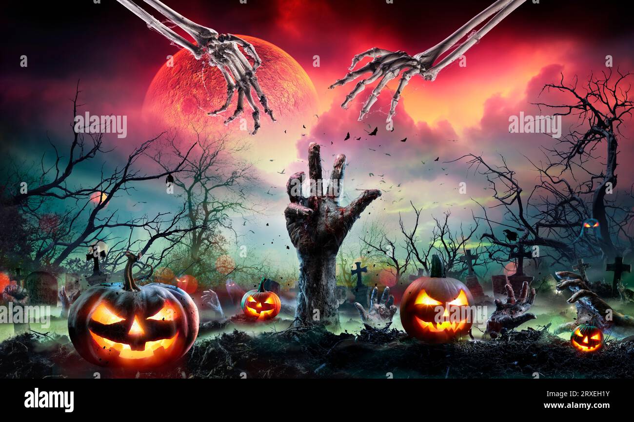 Zombie Hand Rising Out Of A Cemetery In Spooky Night At Red Moonlight ...