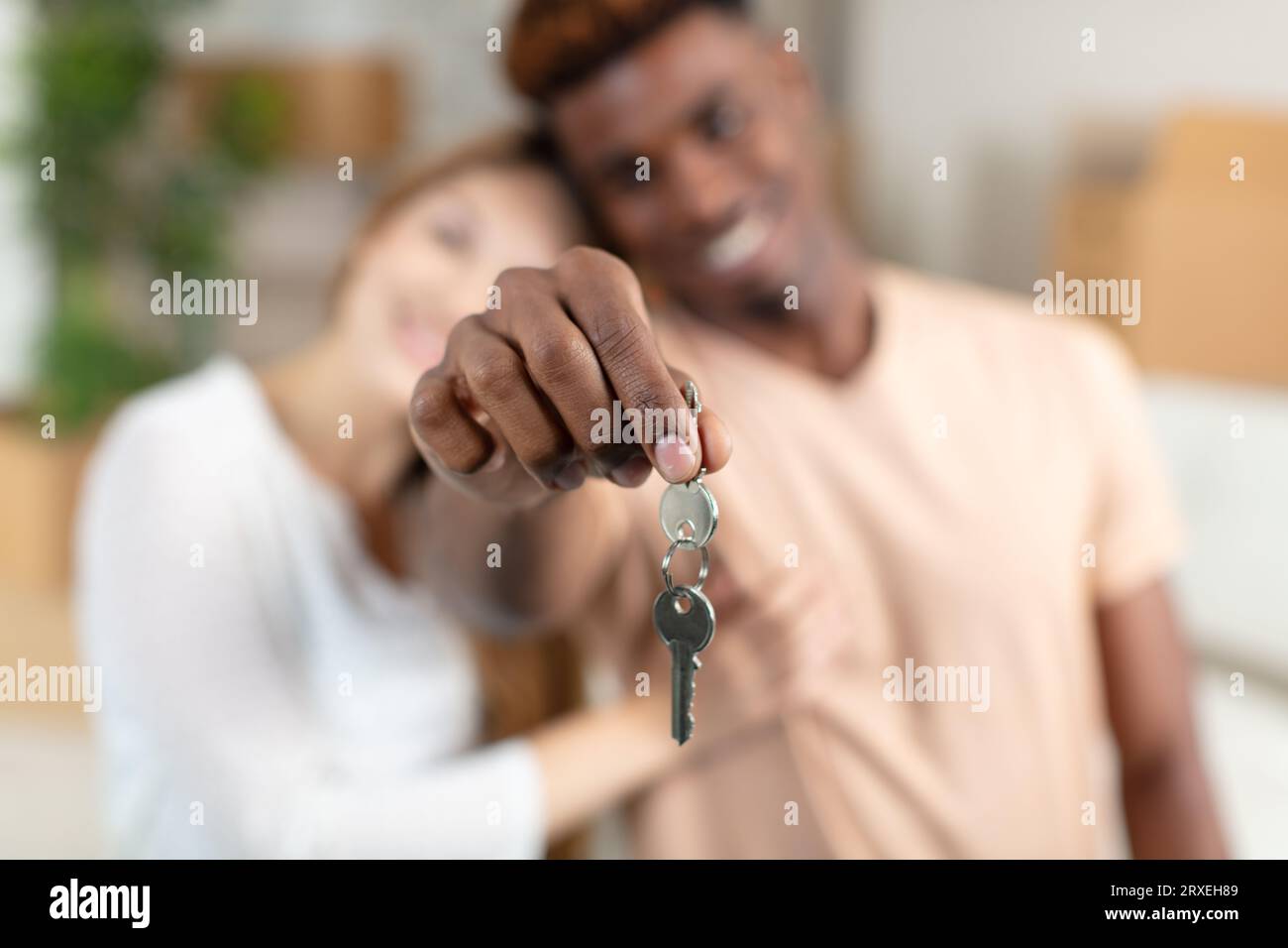 couple showing their new house keys Stock Photo - Alamy