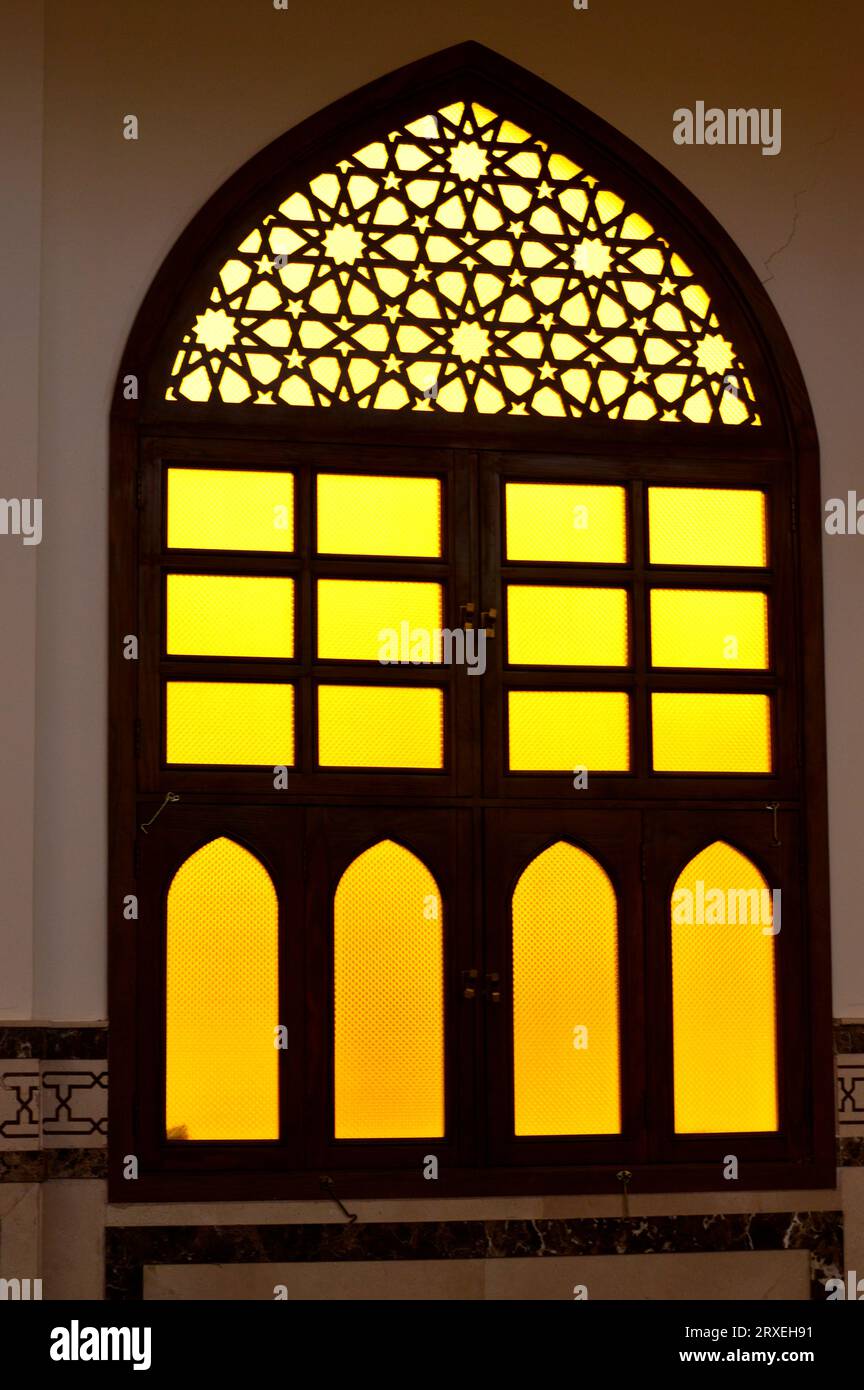 A mosque window made of wood and glass in an Islamic style, a new ...