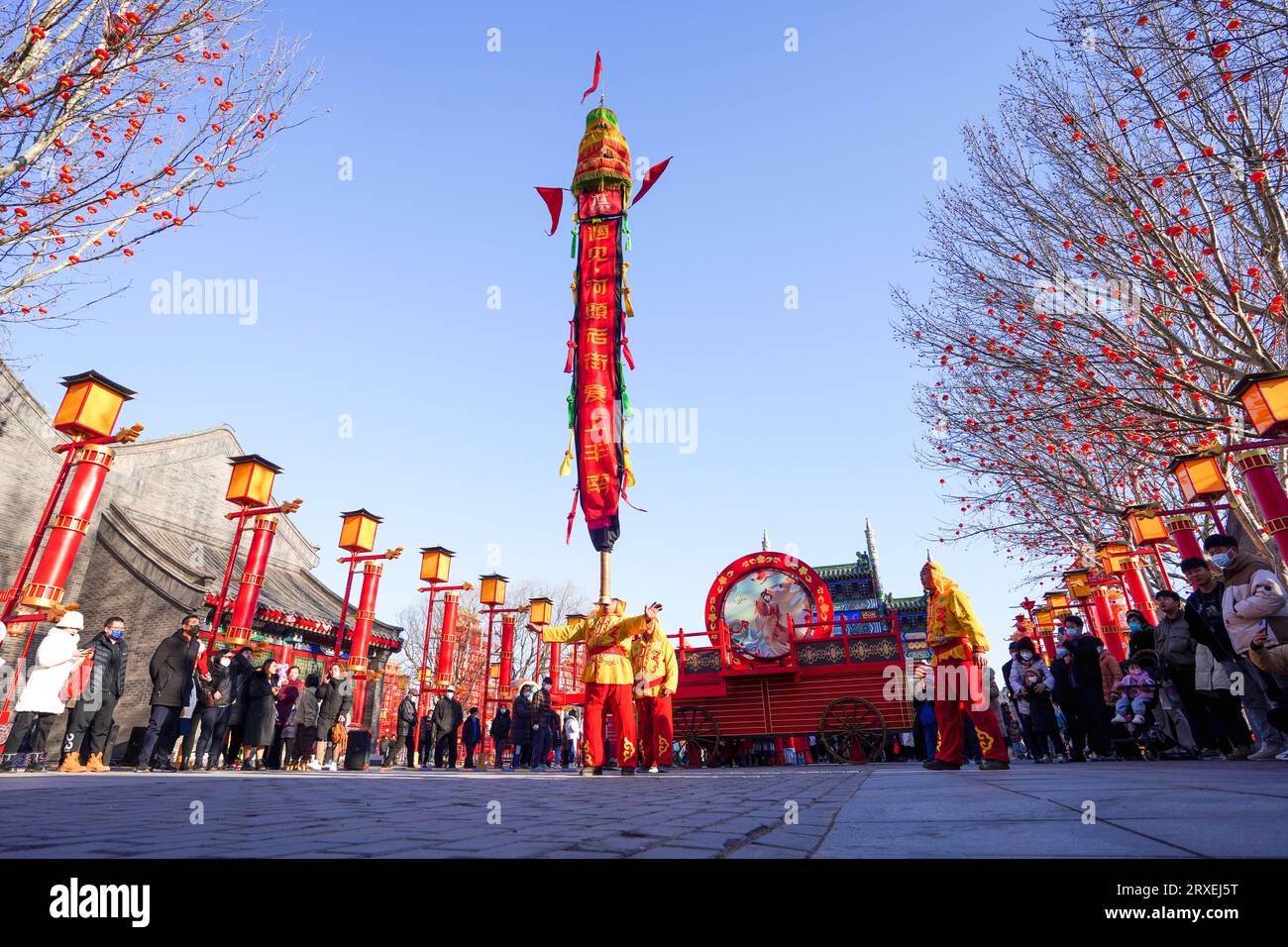 Fengnan City, China - February 4, 2023: Waving a Chinese flag acrobatic ...
