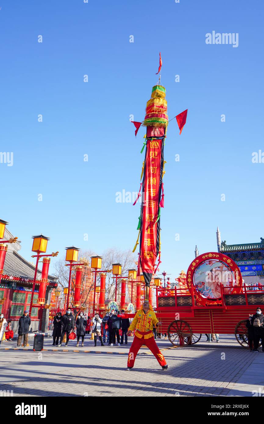 Fengnan City, China - February 4, 2023: Waving a Chinese flag acrobatic ...