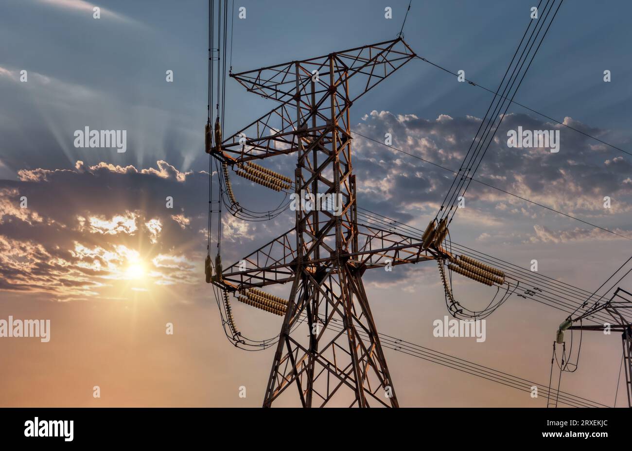 Suspension insulators and strain insulators mounted on the poles in a ...