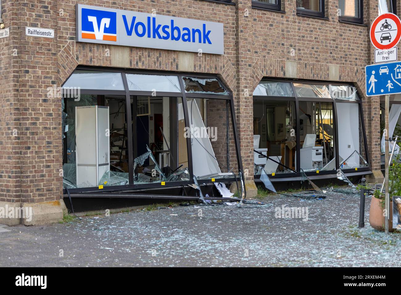 Erfstadt, Germany. 25th Sep, 2023. A badly damaged storefront of a bank ... Erfstadt, Germany. 25th Sep, 2023. A badly damaged storefront of a bank ...