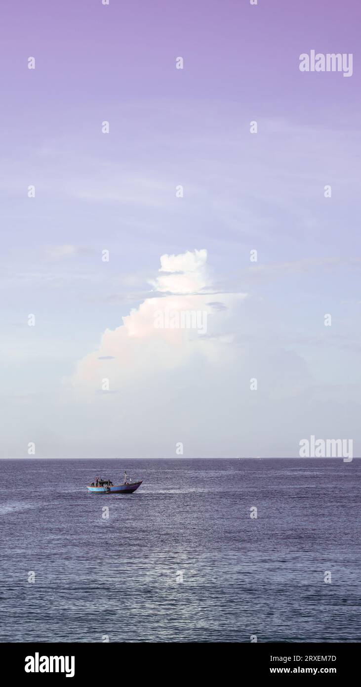 Sea sky cumulus cloud landscape view background. Calm water alone fishing boat. Destination aim ...