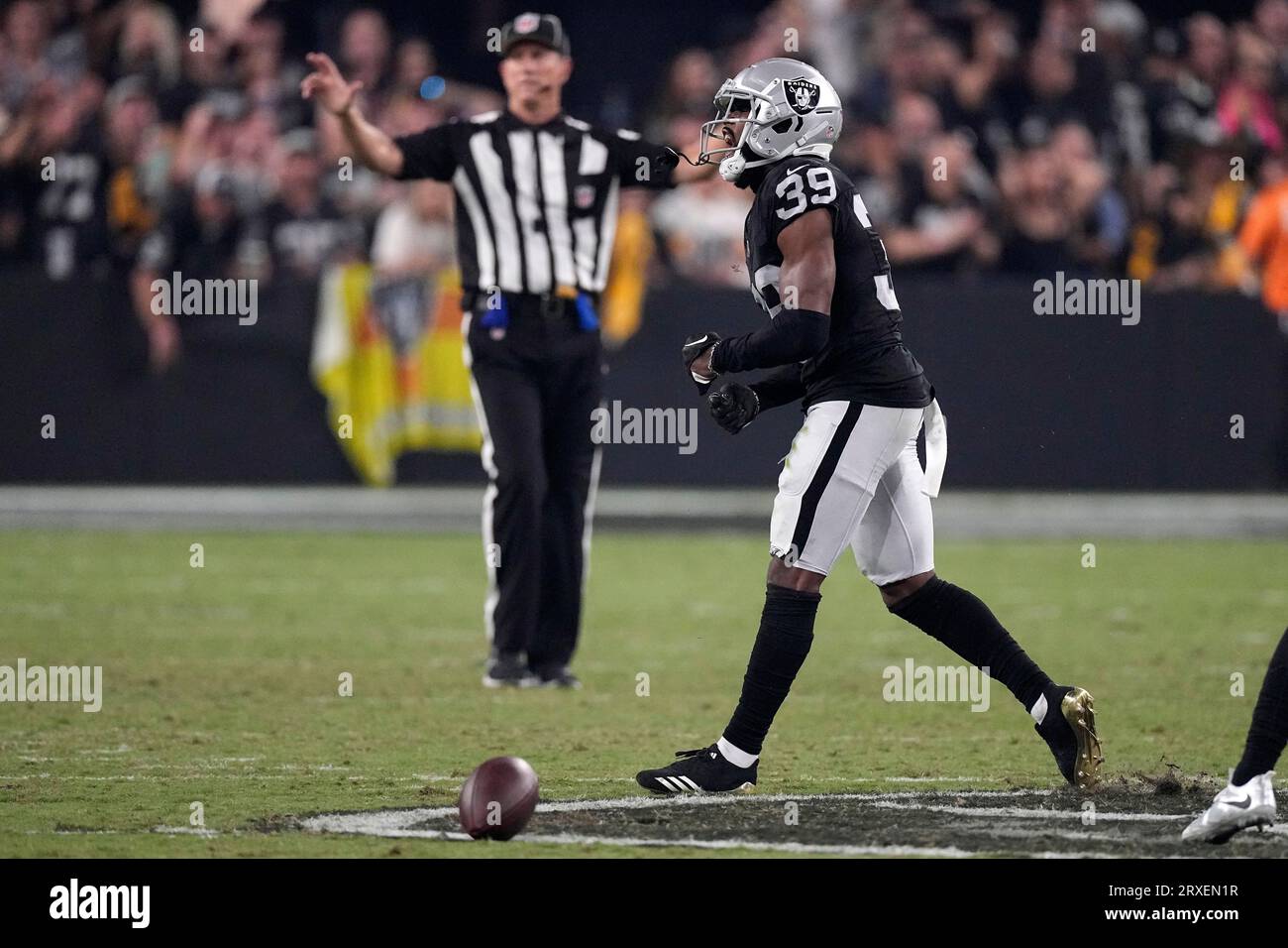 Las Vegas Raiders cornerback Nate Hobbs celebrates after breaking up a ...