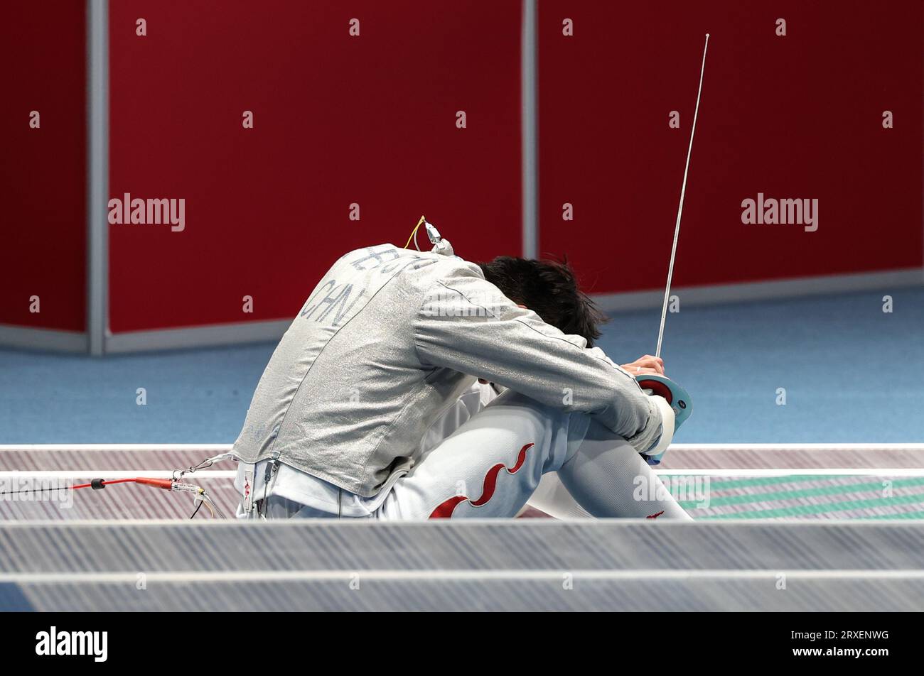 Hangzhou, China's Zhejiang Province. 25th Sep, 2023. Shen Chenpeng of China reacts during the ...