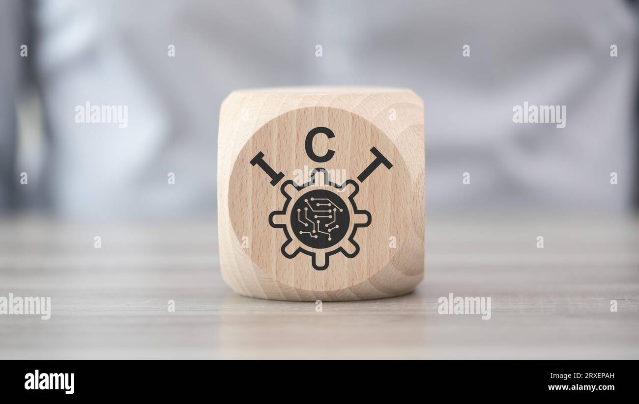 Wooden block with symbol of ict concept Stock Photo - Alamy