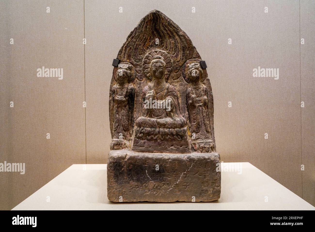 Beijing China, February 16, 2023: Stone Triad of a Buddha with Two ...