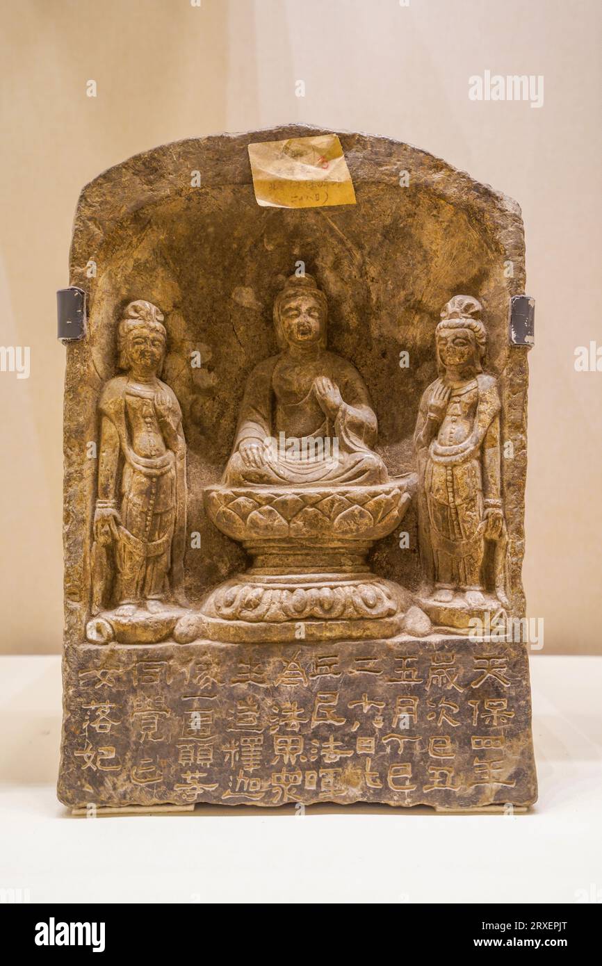 Beijing China, February 16, 2023: Stone Triad of a Buddha with Two ...