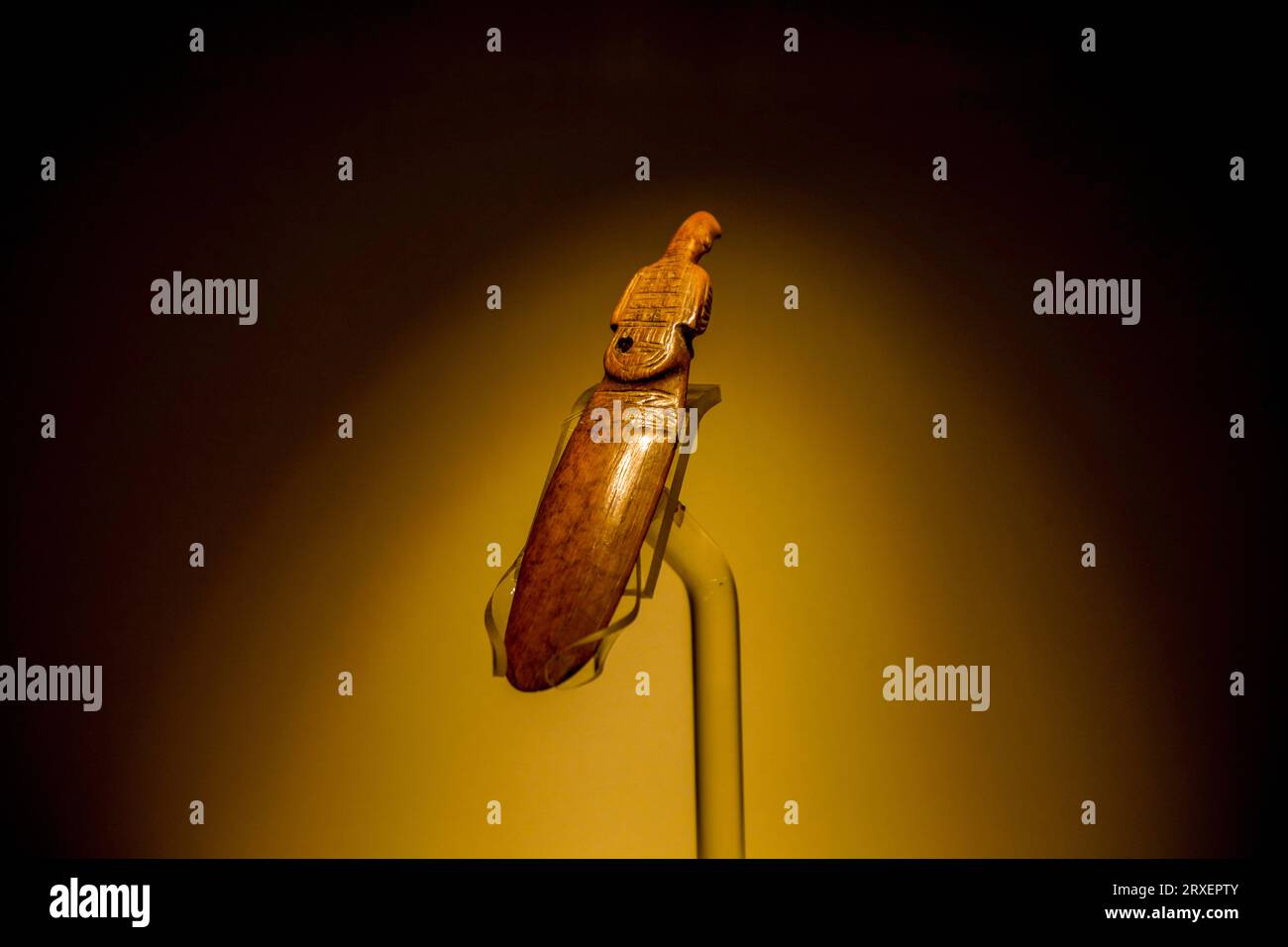 Beijing China, February 16, 2023: Hemudu culture tooth carving phoenix ...