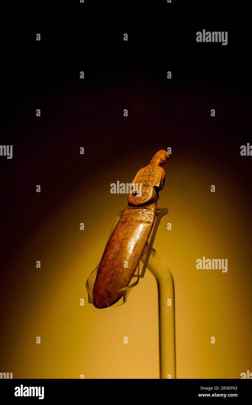 Beijing China, February 16, 2023: Hemudu culture tooth carving phoenix ...