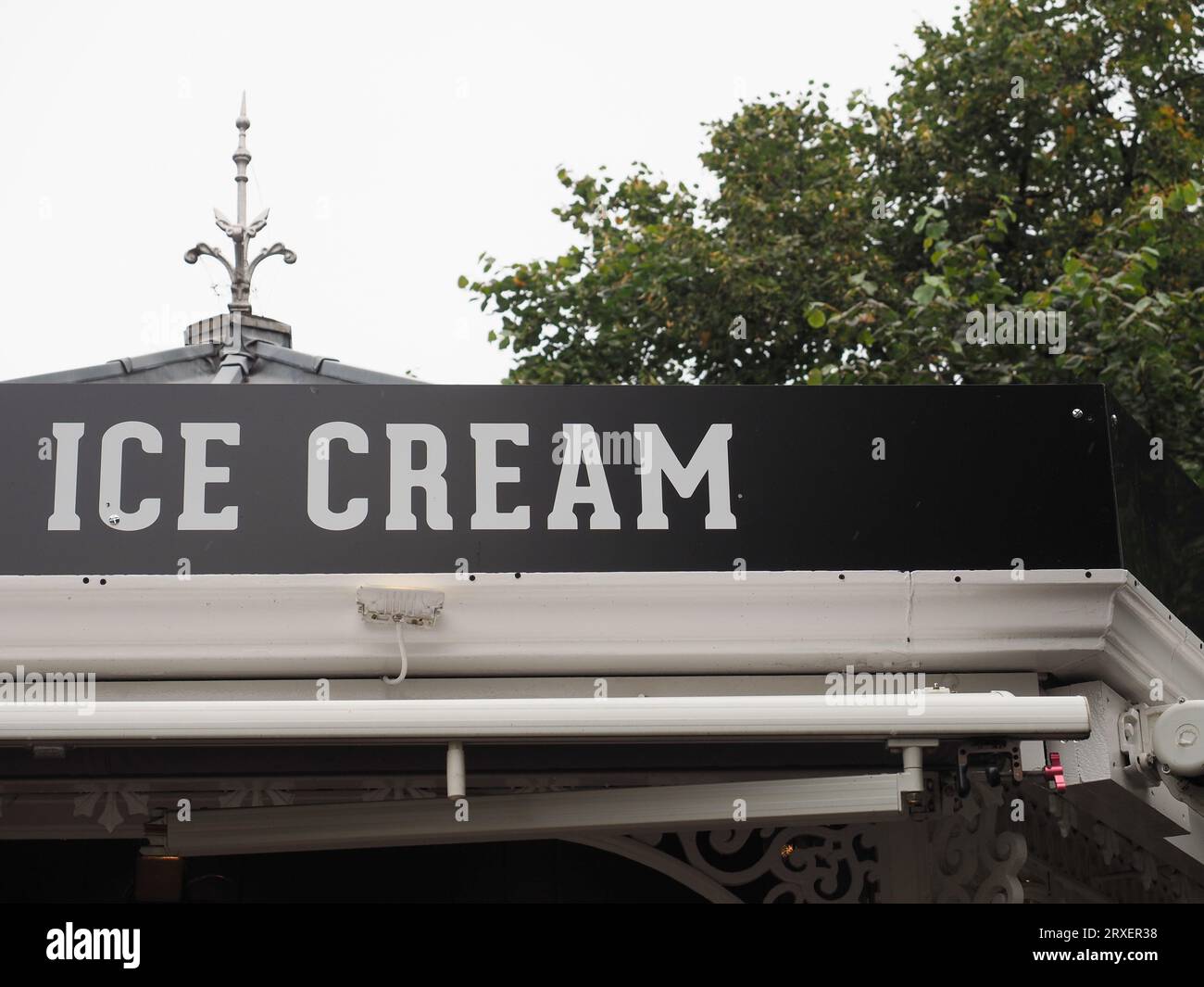 ice cream sign on a refreshment kiosk Stock Photo - Alamy
