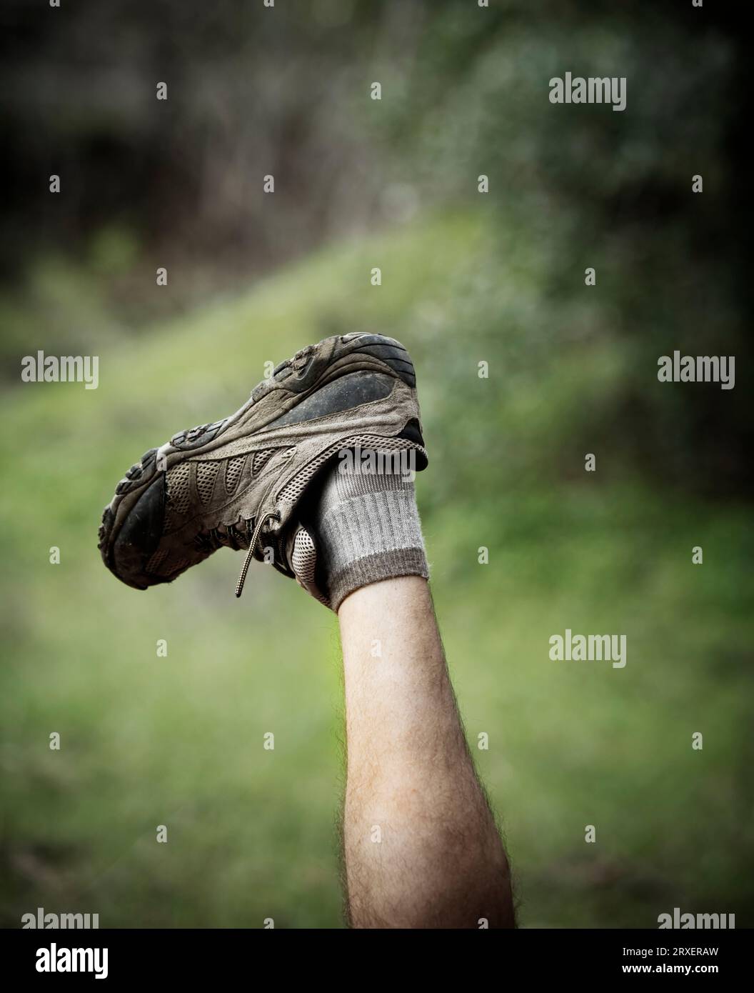 A leg and hiking shoe in the air Stock Photo - Alamy