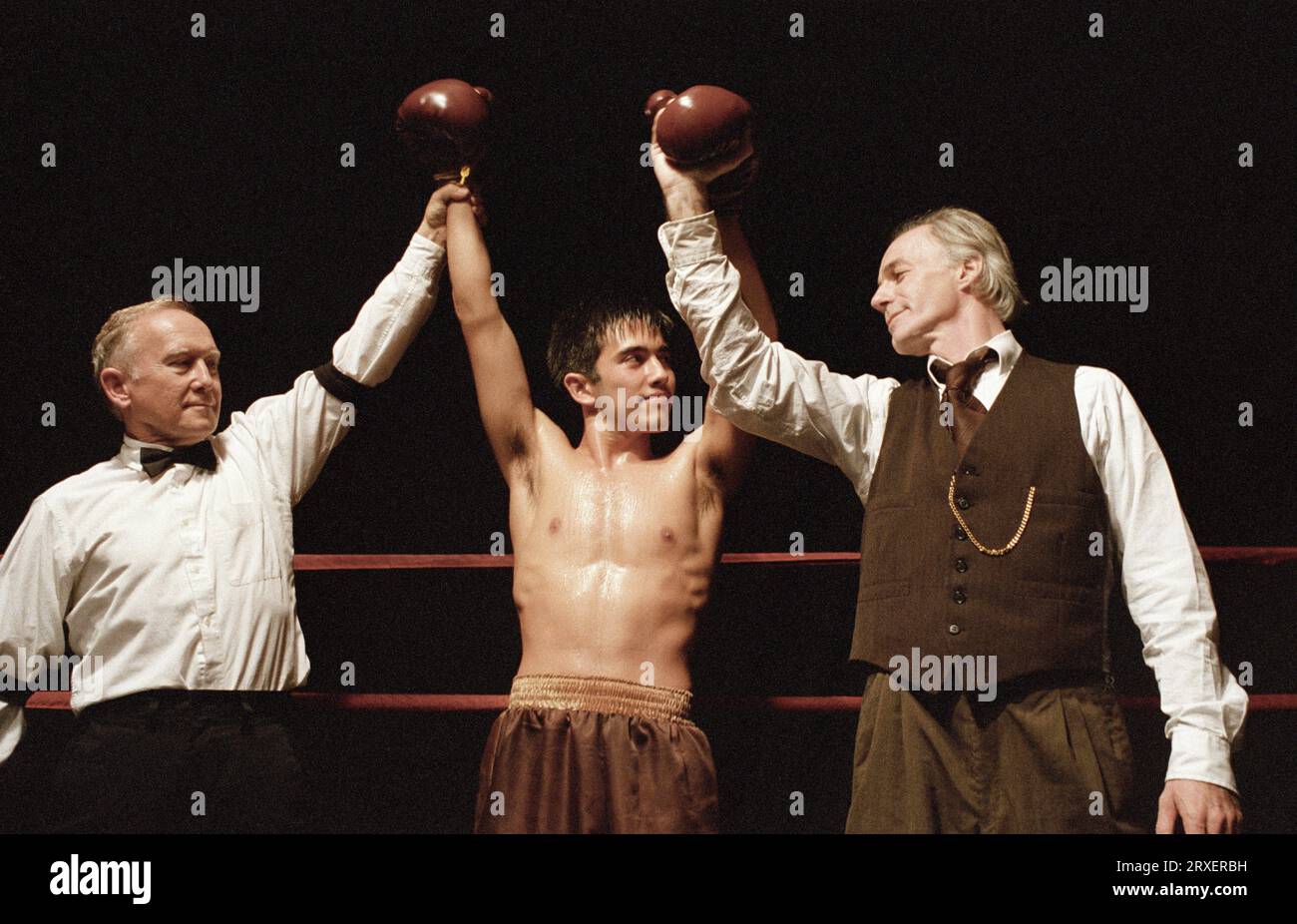 A referee, coach, boxer in boxing ring Stock Photo - Alamy