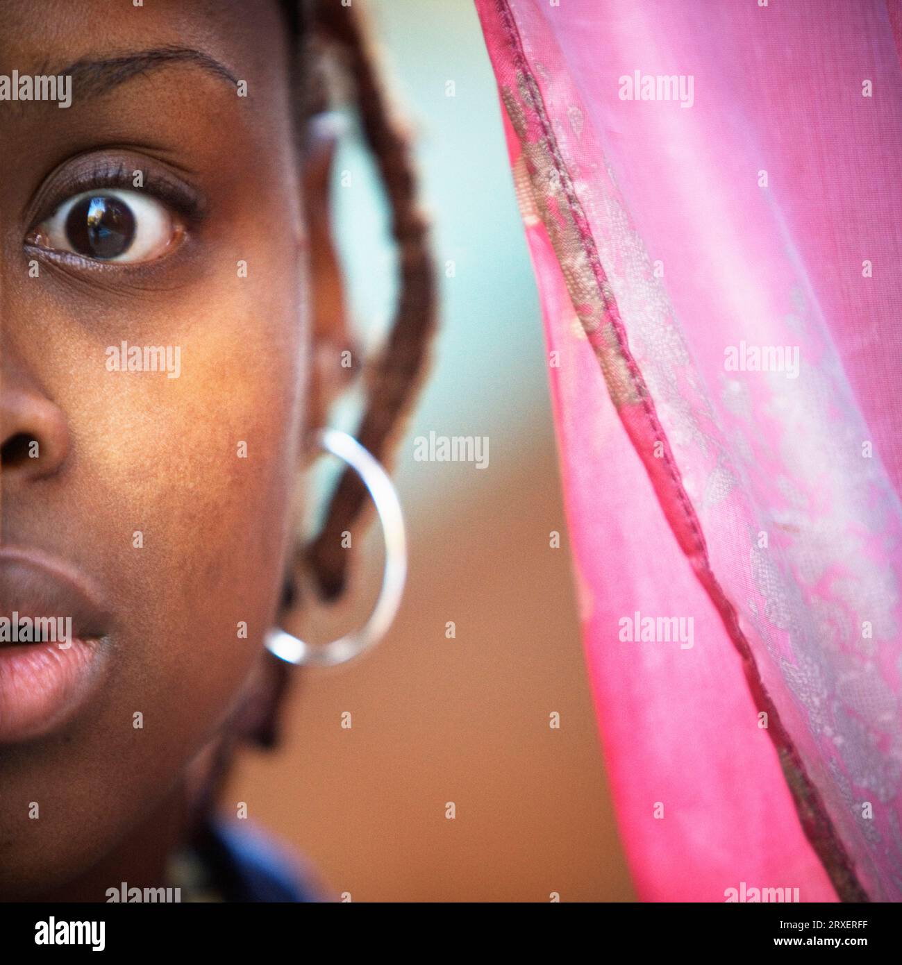 Portrait wide eyed staring woman hi-res stock photography and images ...
