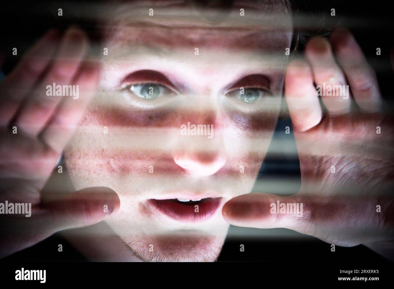 Hands pressed against window hi-res stock photography and images - Alamy