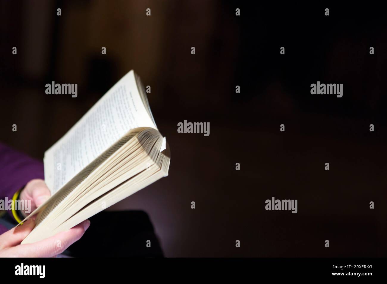 Book being read hi-res stock photography and images - Alamy