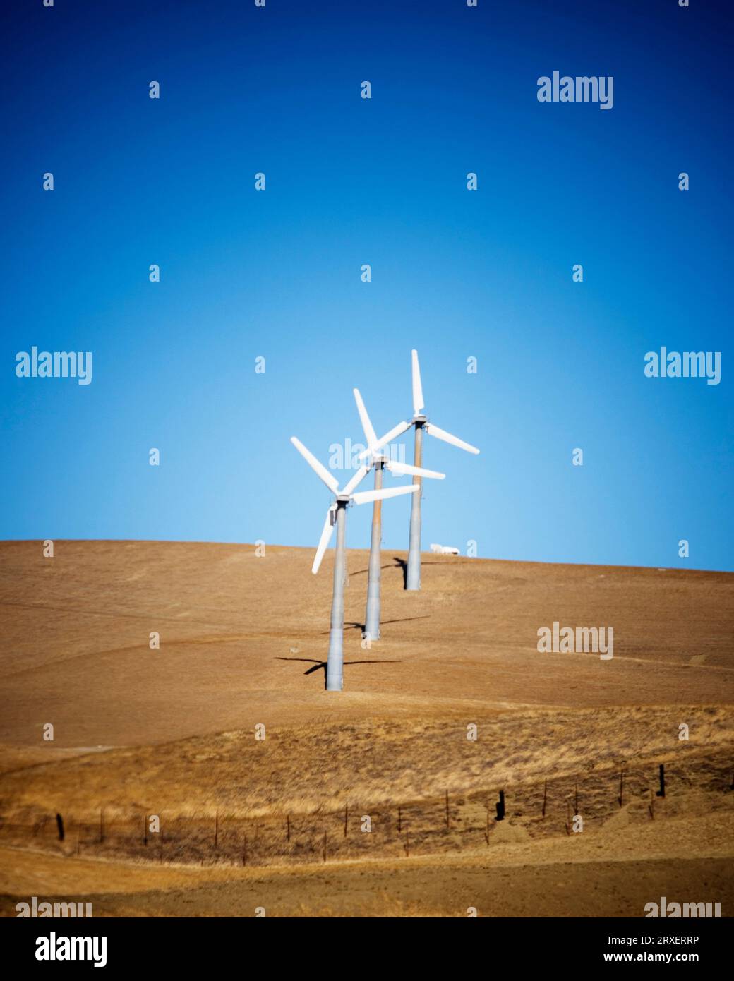 Wind turbines and hills Stock Photo - Alamy