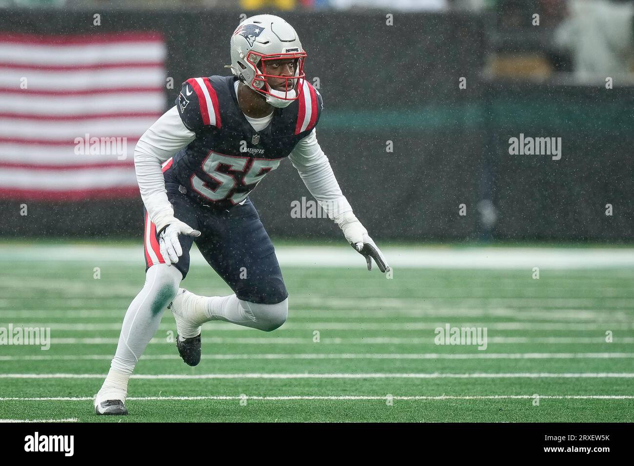 New England Patriots linebacker Josh Uche (55) plays in and an NFL ...