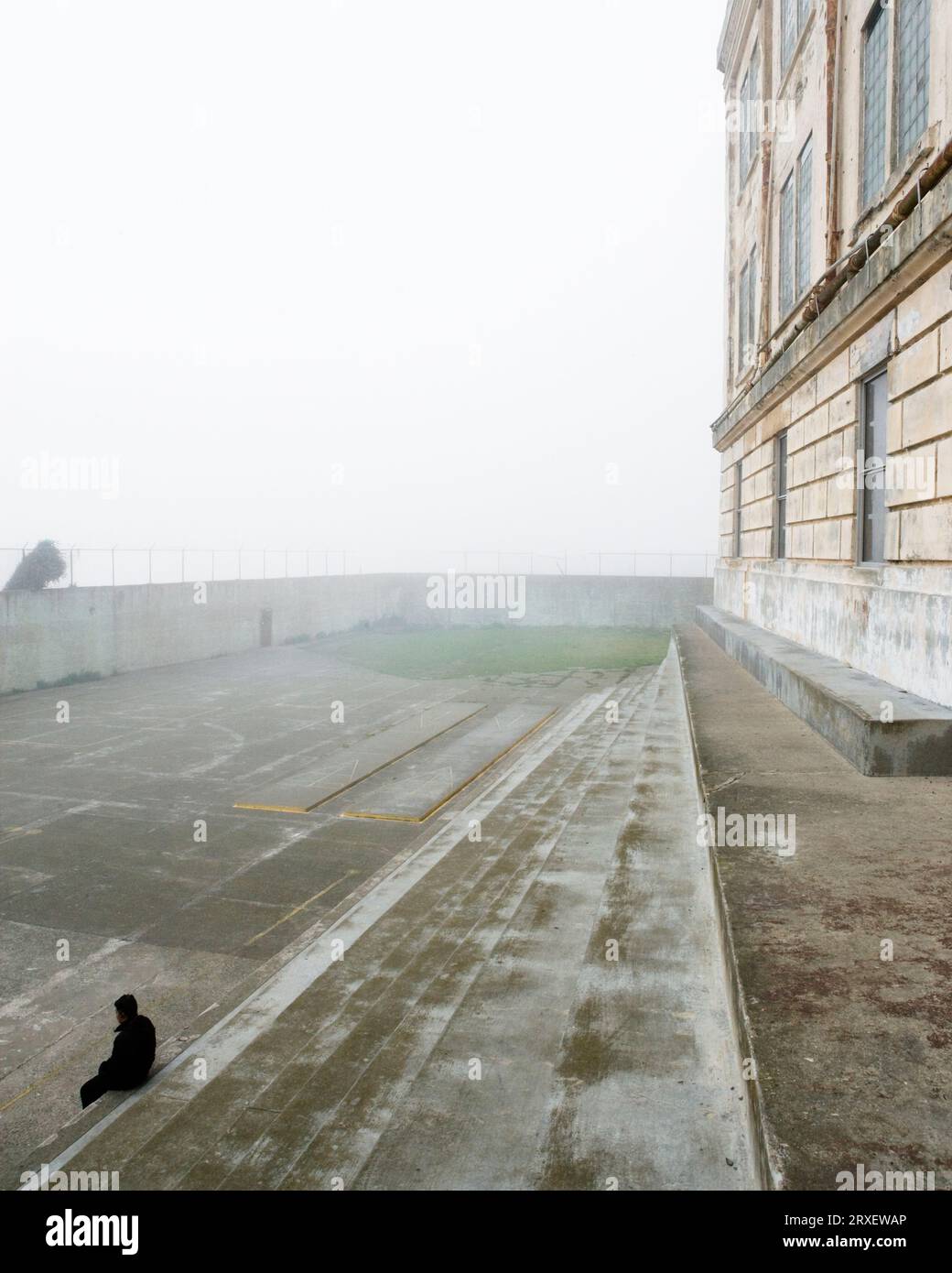 Lone person on steps hi-res stock photography and images - Alamy