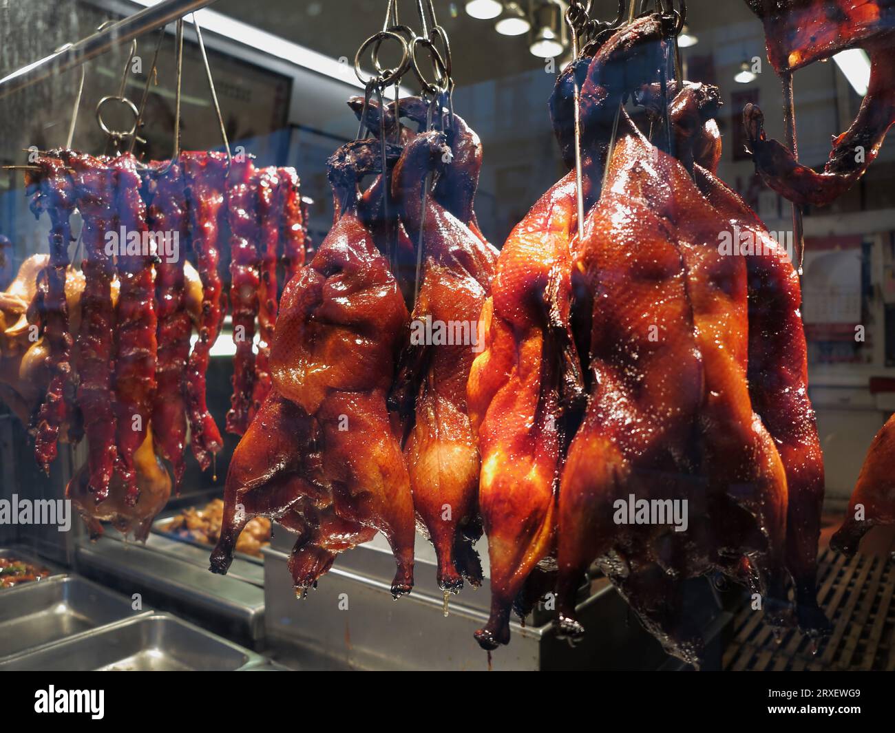 Hanging roasted chickens Stock Photo - Alamy