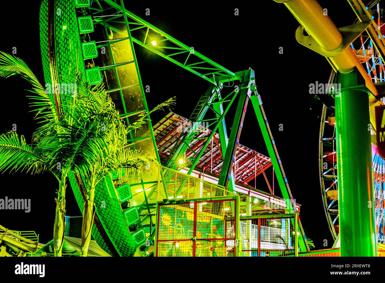 An amusement park ride at night Stock Photo - Alamy