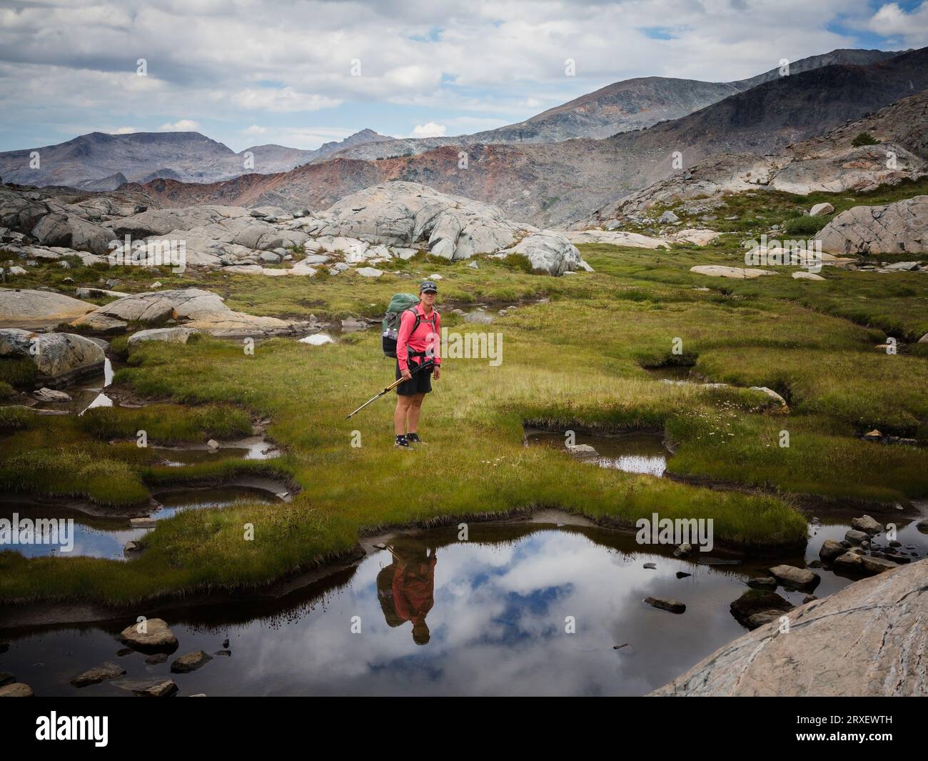 Female backpacker in shirt hi-res stock photography and images - Alamy