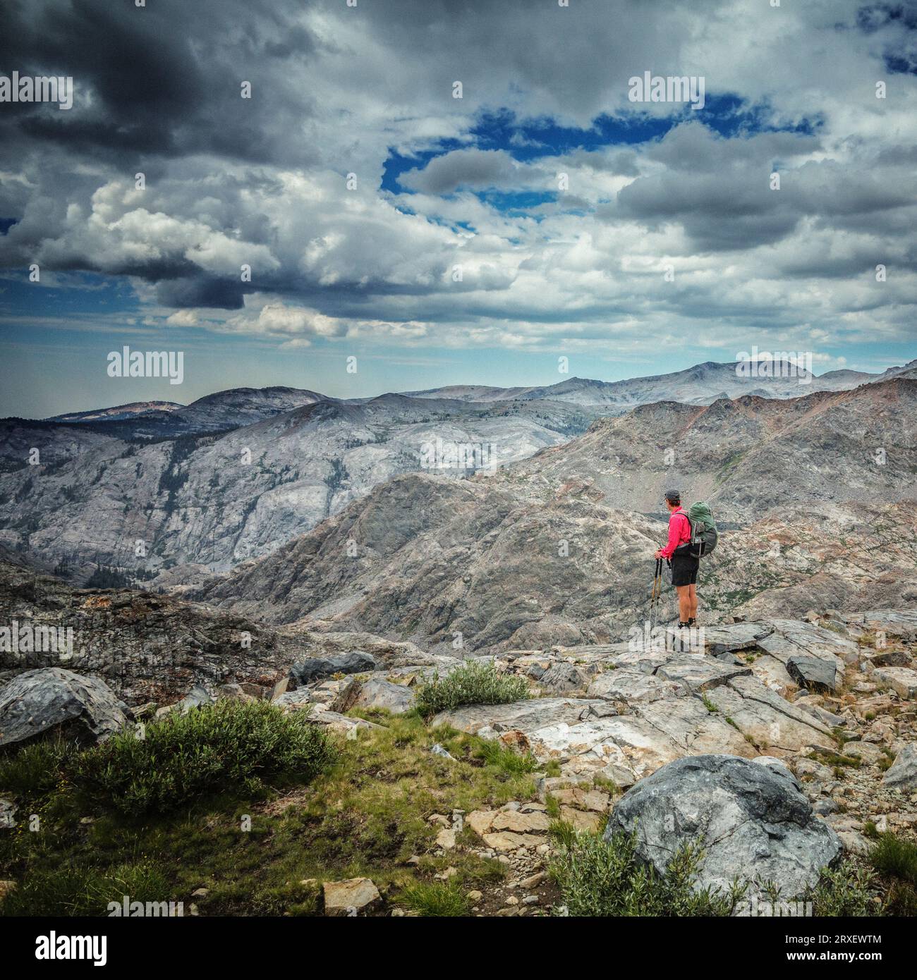 Side view female backpacker hiking hi-res stock photography and images ...