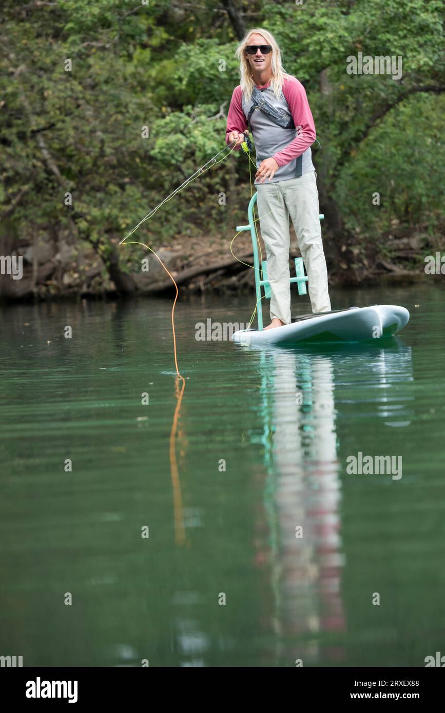 Sup fishing hi-res stock photography and images - Alamy
