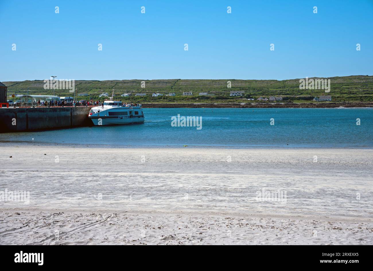 Galway, Ireland - 03 June, 2023. Ferry and sandy beach in Kilronan ...