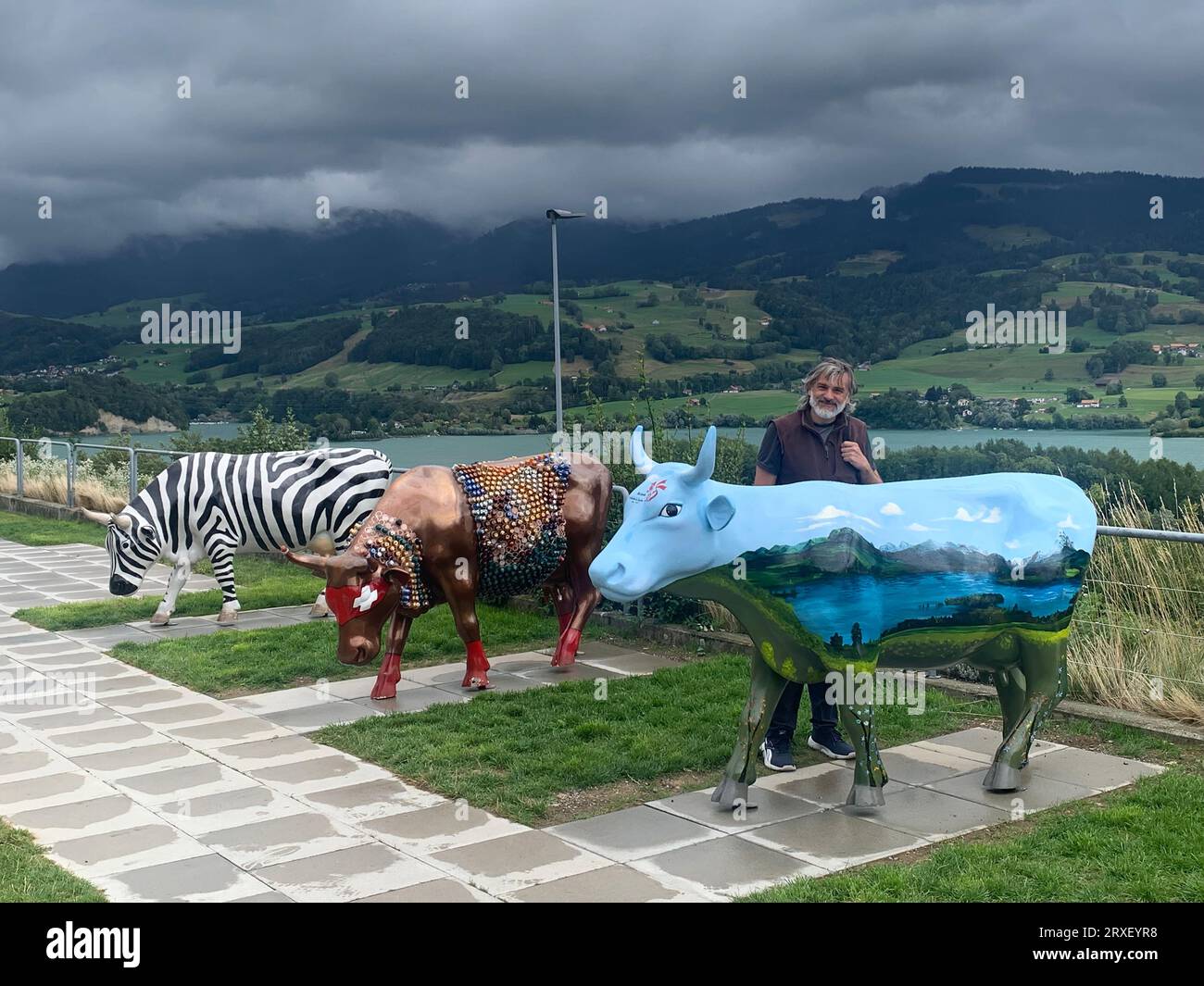 GRUYERE, SWITZERLAND - AUGUST 6, 2023: painted cows at Motel de la ...