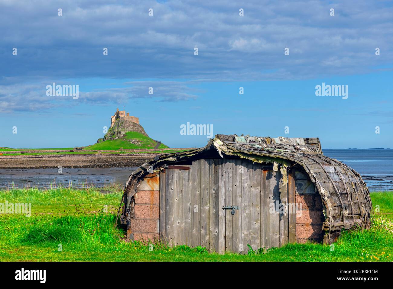 The tidal island of Llindisfarne, also called Holy Island, in ...