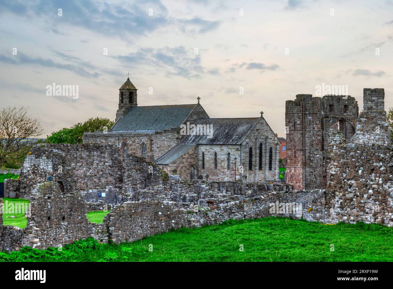 The tidal island of Llindisfarne, also called Holy Island, in ...