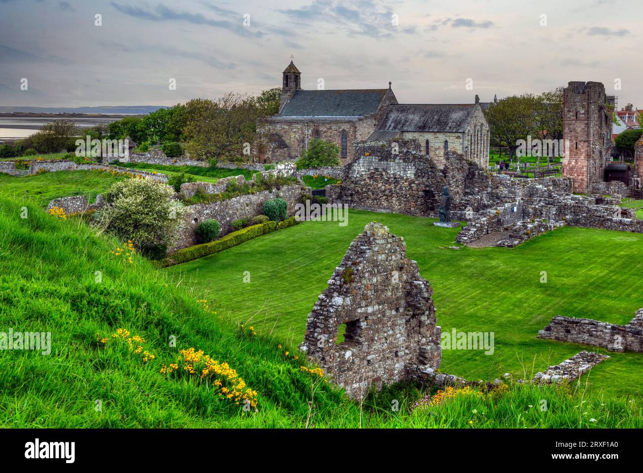 The tidal island of Llindisfarne, also called Holy Island, in ...