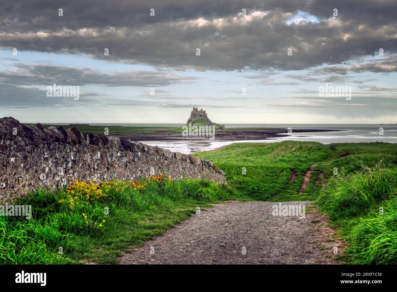 The tidal island of Llindisfarne, also called Holy Island, in ...