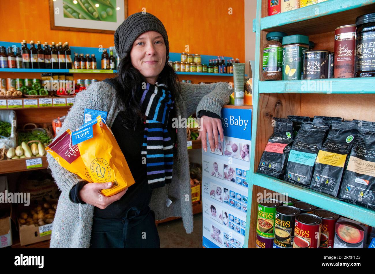 Shop assistant in an organic grocery store and health food shop Stock ...