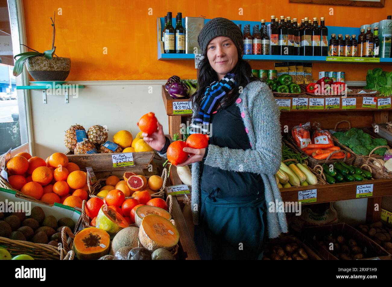 Shop assistant in an organic grocery store and health food shop Stock ...
