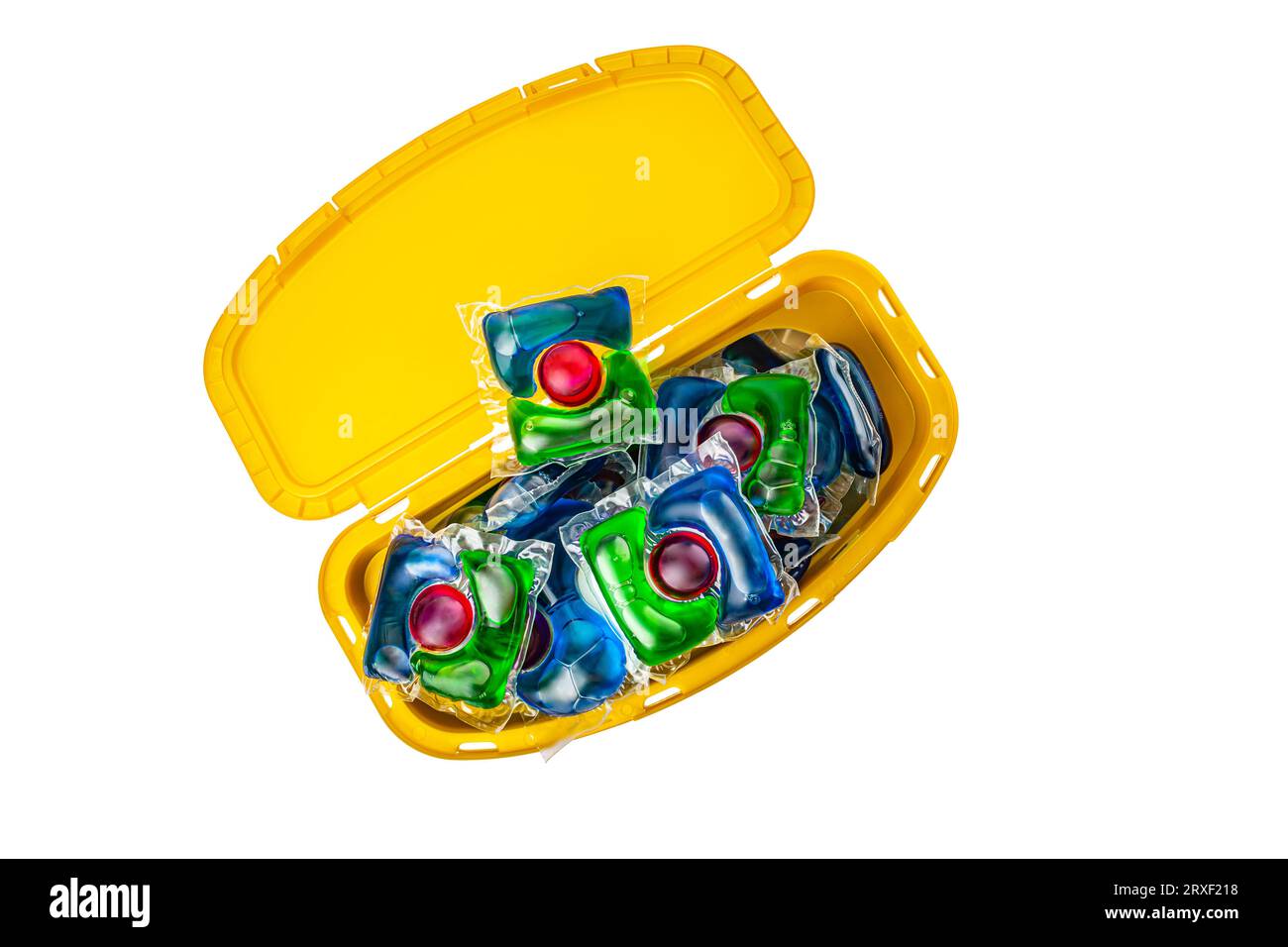 colored washing capsules in plastic container isolated on white ...