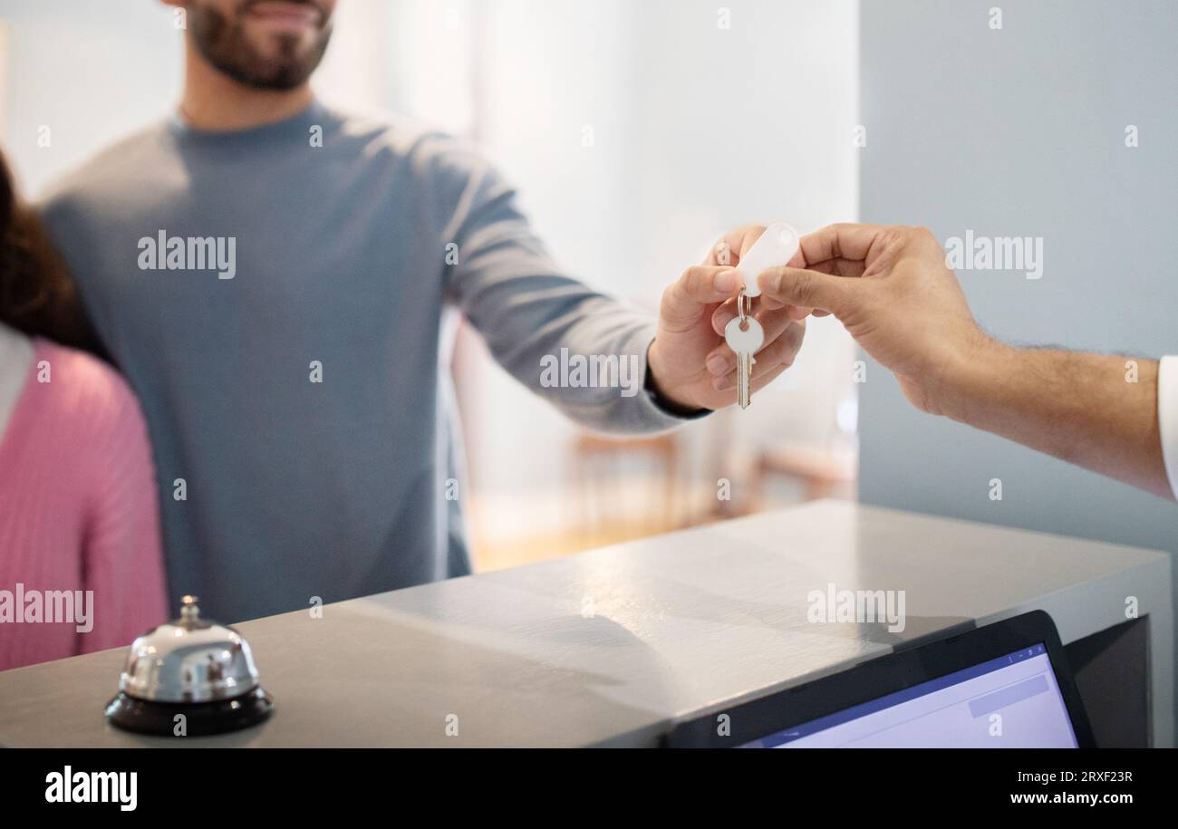 Couple resort check in hi-res stock photography and images - Alamy