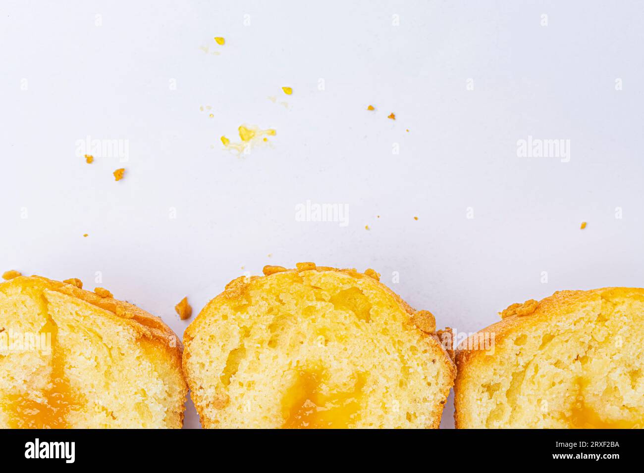 muffins cut on a white background with crumbs. High quality photo Stock ...