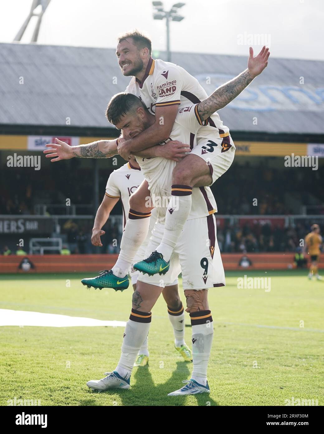 Bradford City's Andy Cook (centre) celebrates scoring his side’s fourth ...