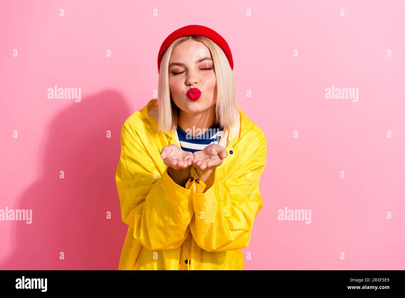 Photo of charming girl sending air kiss flirty message for subscribers ...