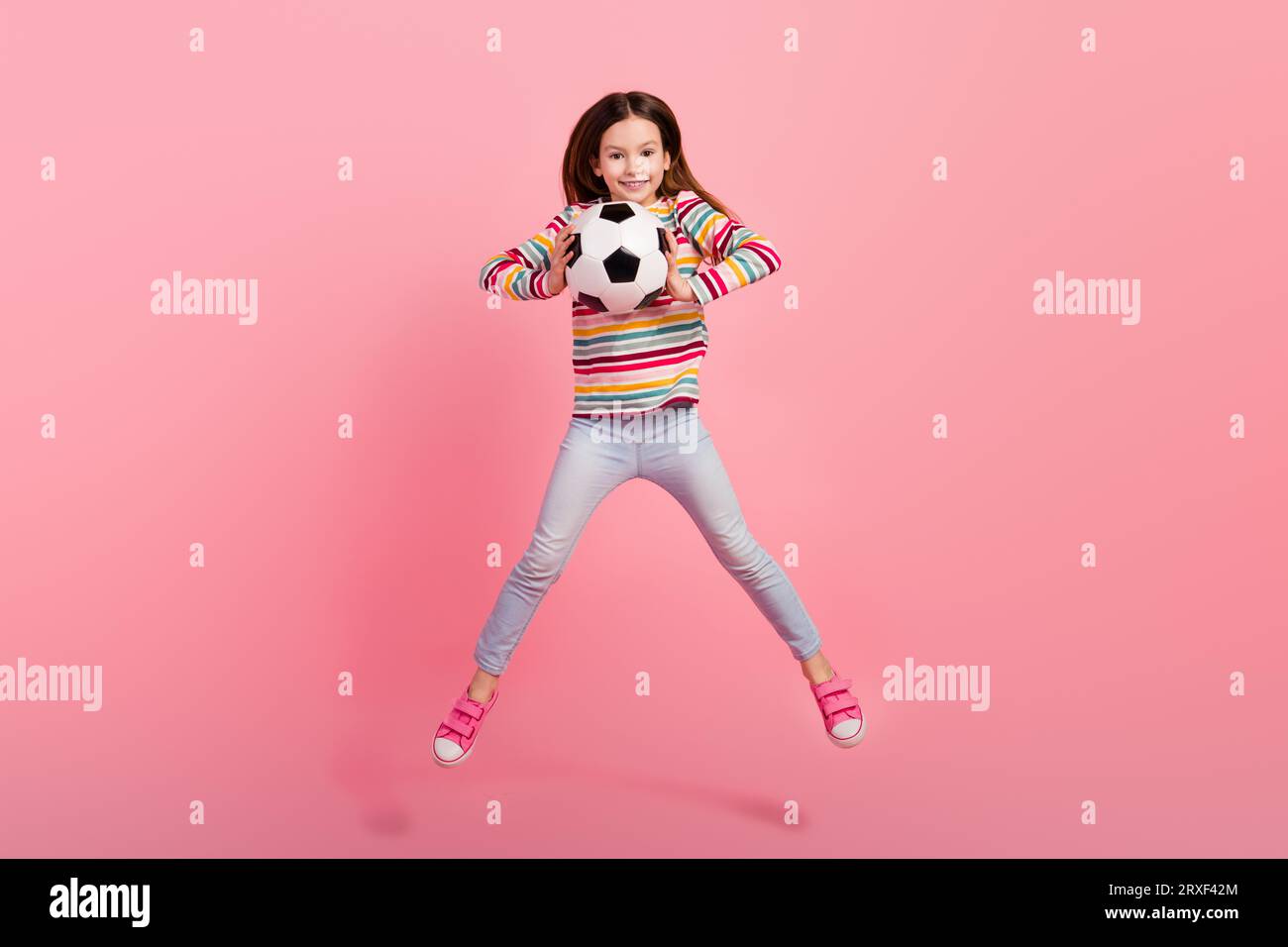 Full body photo cadre of jumper crazy small brown hair champion goalkeeper playing football girl ...