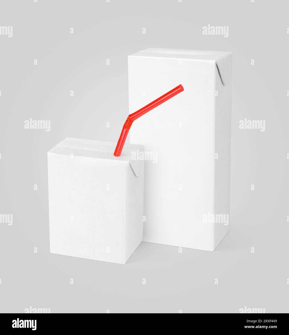 Group of different milk or juice carton packages with red straw on gray ...