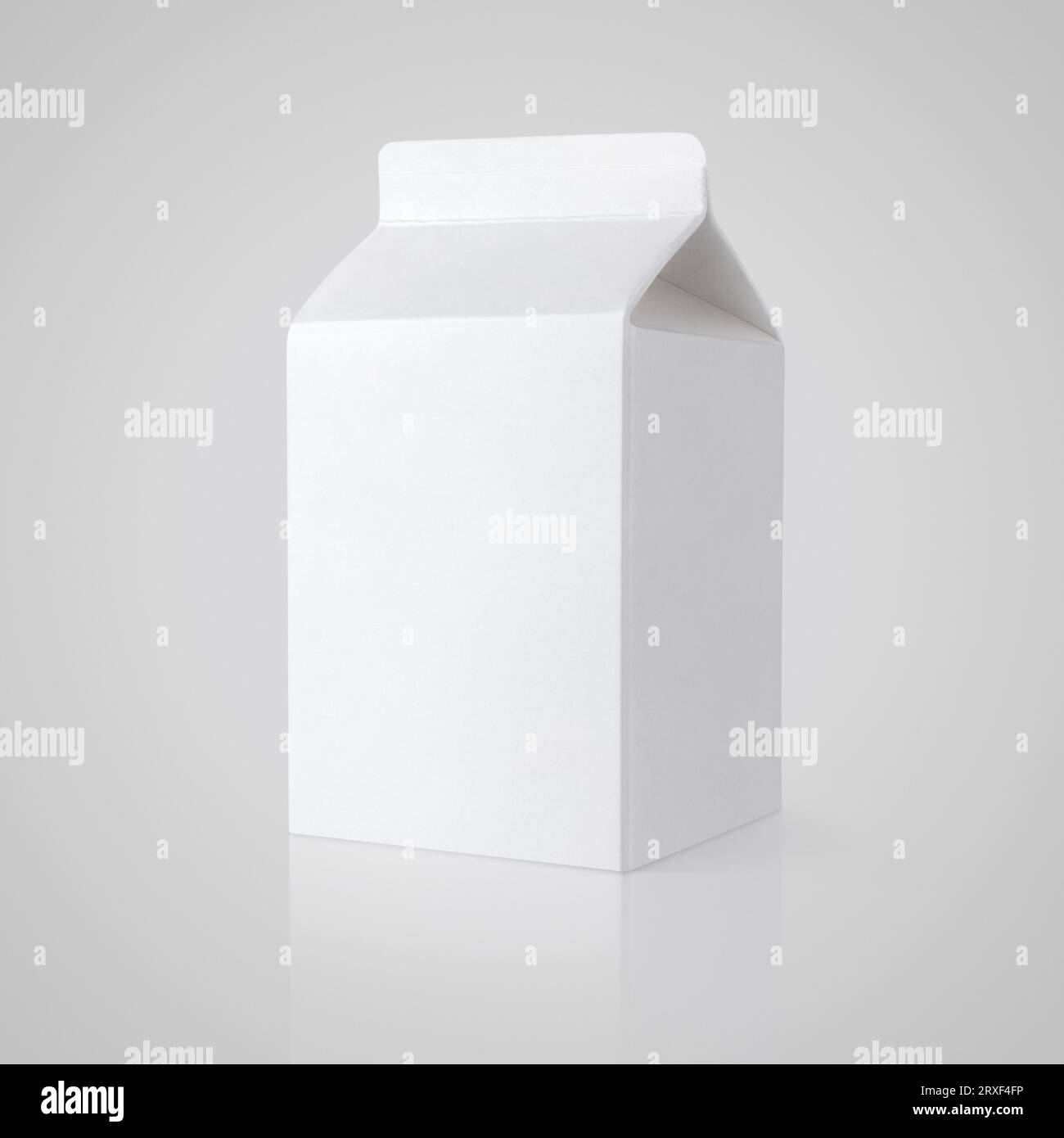White blank milk carton package on gray background with clipping path ...
