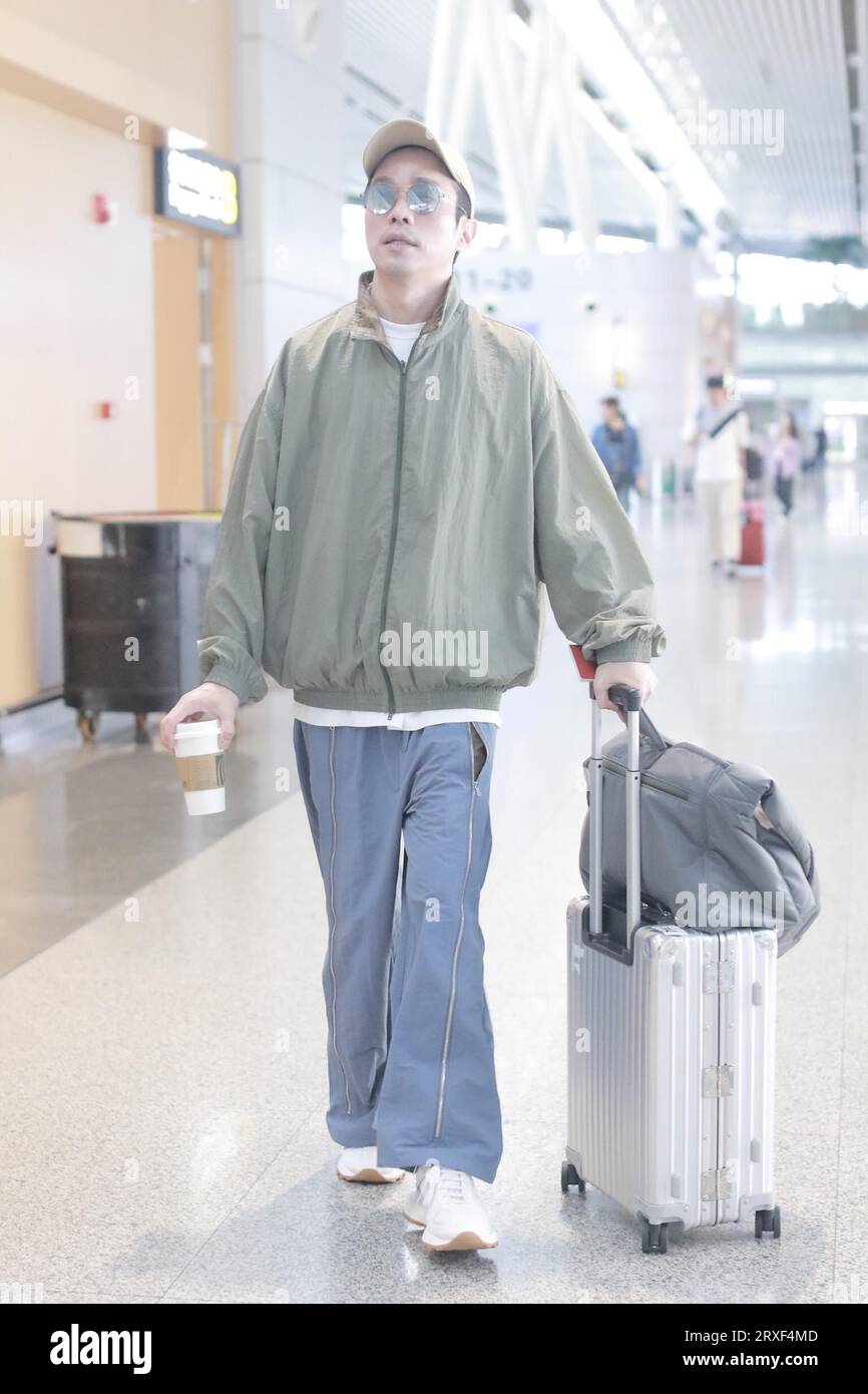 Malaysian Chinese singer Nicholas Teo appears at the airport in ...